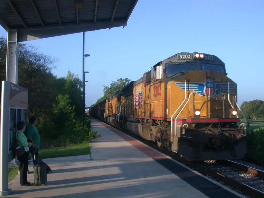 UP 5203 UP 9531 28Sep2009 NB at AmTrak Station with General Merchandise